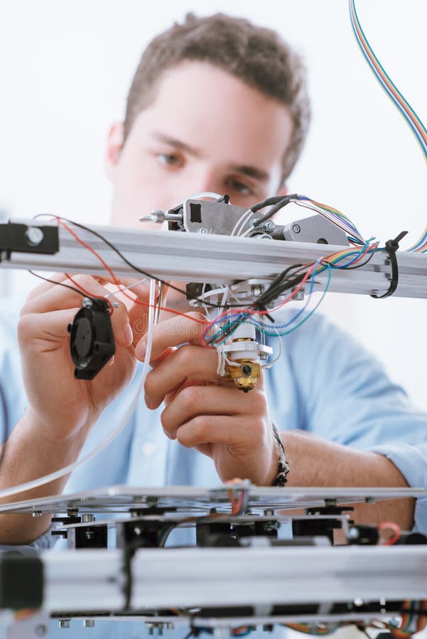 Young Engineer Working on a 3D Printer Stock Photo - Image of design ...