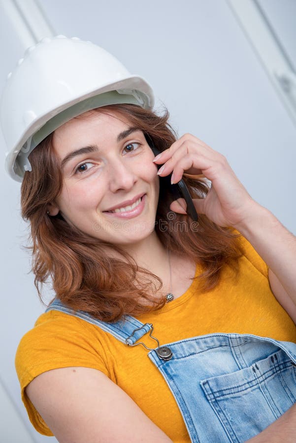 Young Engineer Woman with Safety Helmet Talking on Phone Stock Image ...