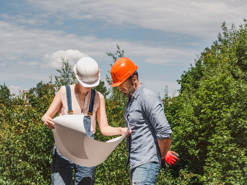 Young Engineer and Worker in the Park Stock Photo - Image of contractor ...