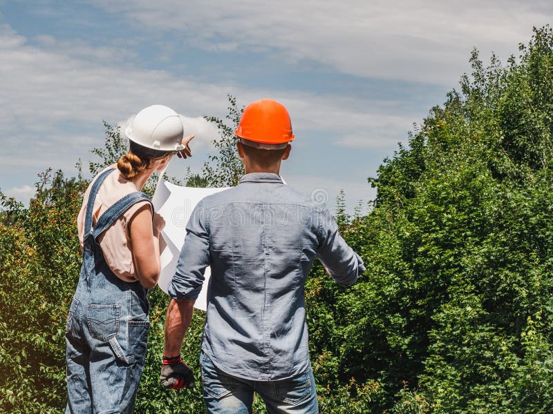 Young Engineer and Worker in the Park Stock Photo - Image of female ...