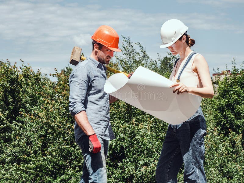 Young Engineer and Worker in the Park Stock Image - Image of attractive ...