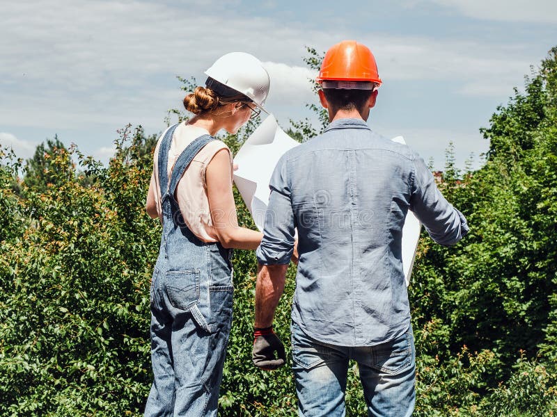 Young Engineer and Worker in the Park Stock Photo - Image of project ...
