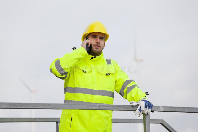 Engineer with mobile phone stock image. Image of phone - 10776527