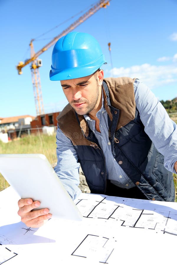 Young Engineer Working with Blueprint Stock Image - Image of industry ...