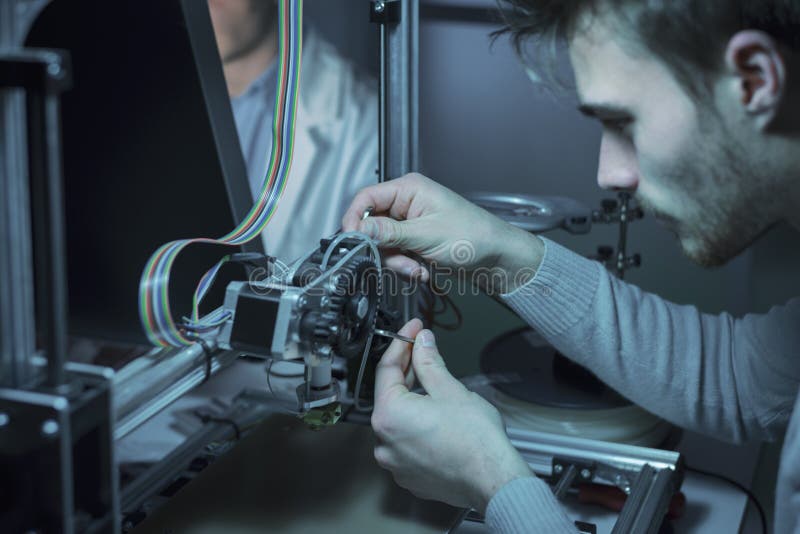 Engineering Team Working on a 3D Printer Stock Image - Image of coat ...