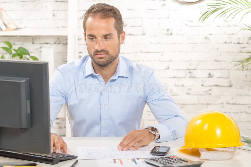 Young Engineer Working on His Computer Stock Photo - Image of sitting ...