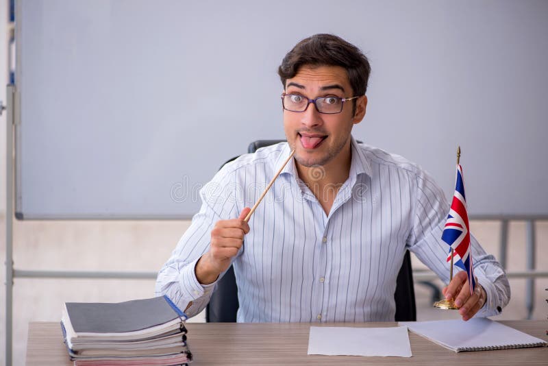 Young Male English Language Teacher in the Classroom Stock Photo ...