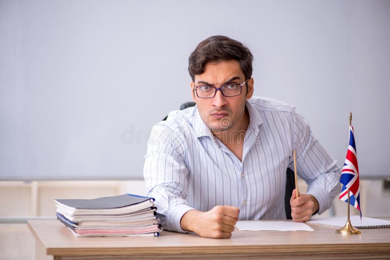 Young Male English Language Teacher in the Classroom Stock Image ...