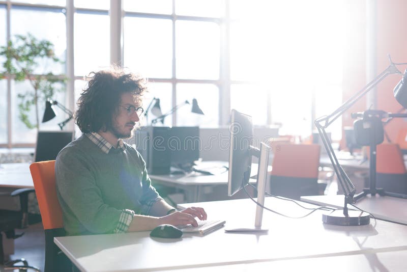 Businessman Working Using a Computer in Startup Office Stock Image ...