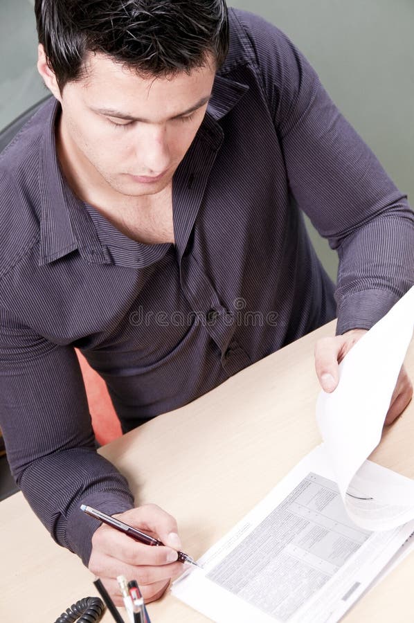 Young Entrepreneur Signing Papers Stock Photo - Image of office ...