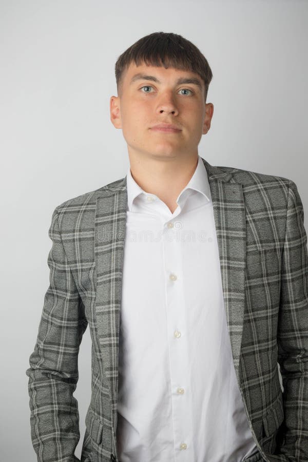 Young Entrepreneur Wearing a Suit Jacket and Open Neck Shirt Stock ...