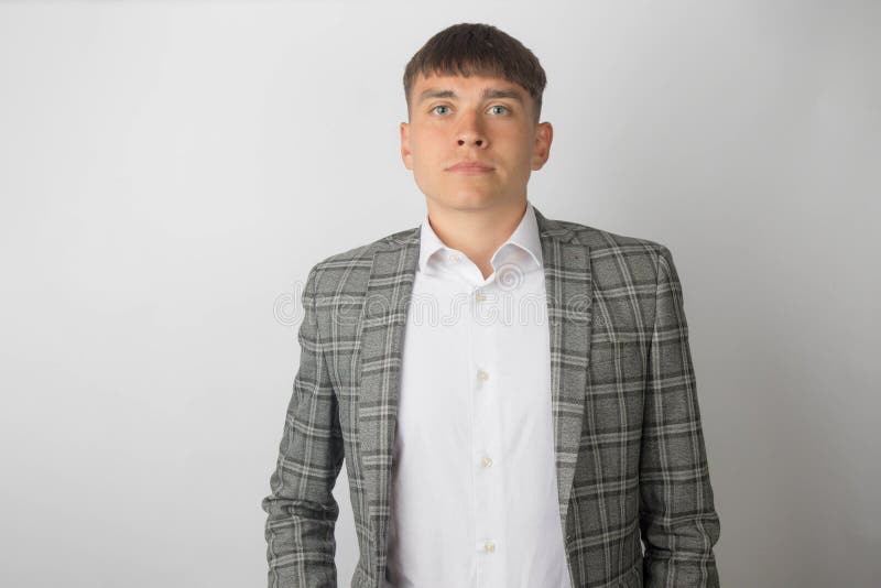 Young Entrepreneur Wearing a Suit Jacket and Open Neck Shirt Stock ...