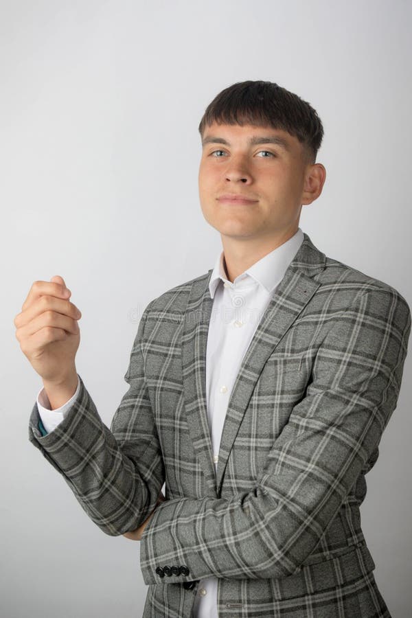 Young Entrepreneur Wearing a Suit Jacket and Open Neck Shirt Stock ...