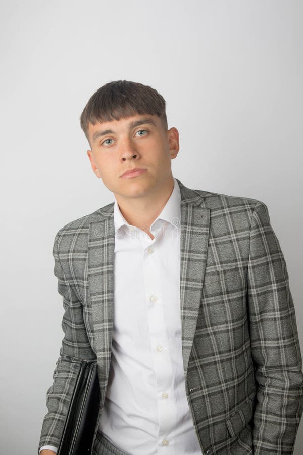 Young Entrepreneur Wearing a Suit Jacket and Open Neck Shirt Stock ...