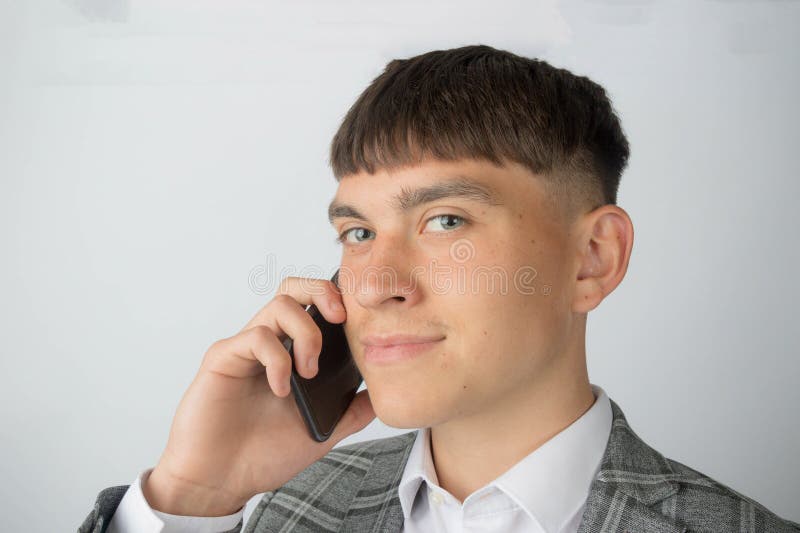 Young Entrepreneur Wearing a Suit Jacket and Open Neck Shirt Stock ...