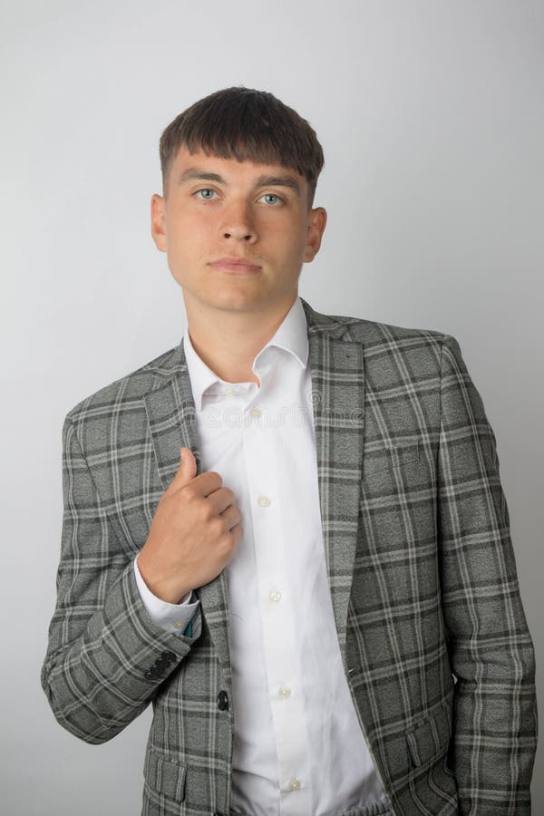 Young Entrepreneur Wearing a Suit Jacket and Open Neck Shirt Stock ...