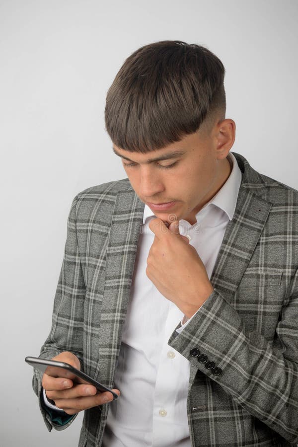Young Entrepreneur Wearing a Suit Jacket and Open Neck Shirt Stock ...