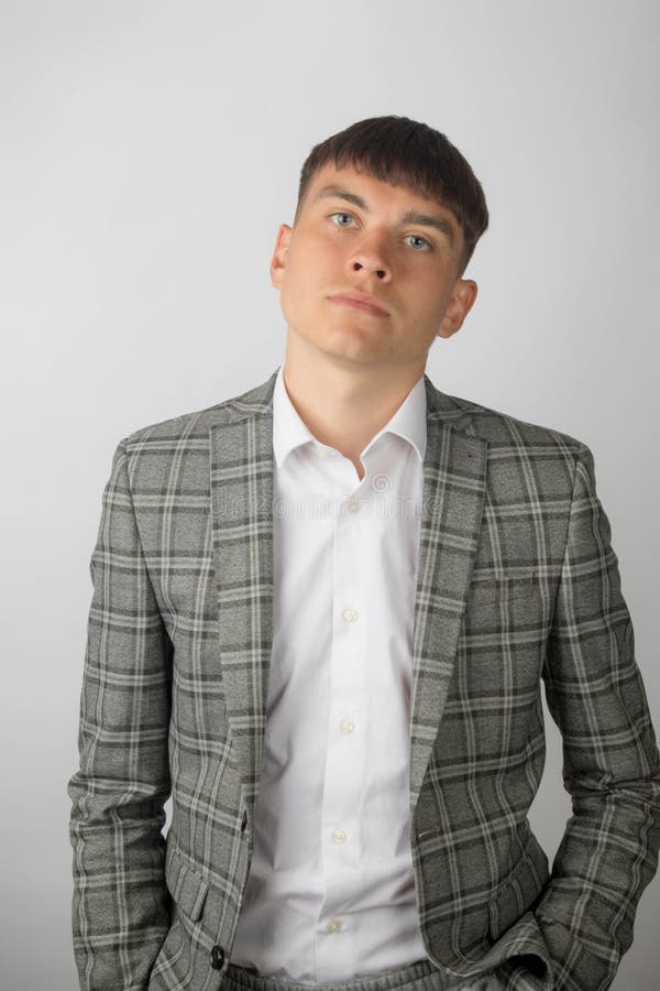 Young Entrepreneur Wearing a Suit Jacket and Open Neck Shirt Stock ...