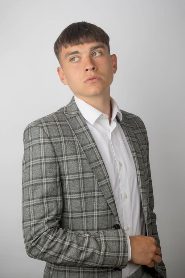 Young Entrepreneur Wearing a Suit Jacket and Open Neck Shirt Stock ...