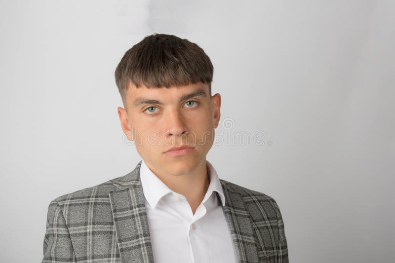 Young Entrepreneur Wearing a Suit Jacket and Open Neck Shirt Stock ...