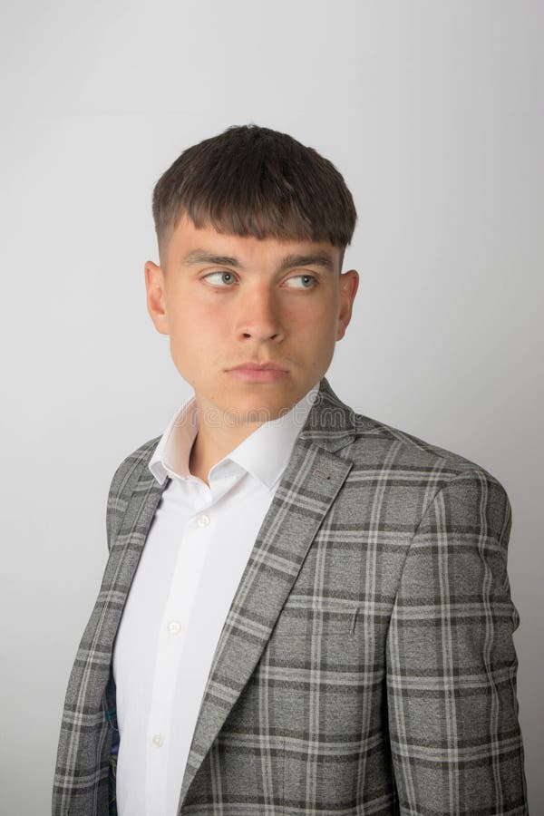 Young Entrepreneur Wearing a Suit Jacket and Open Neck Shirt Stock ...