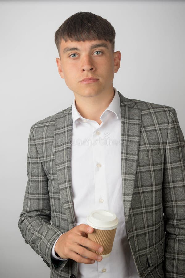 Young Entrepreneur Wearing a Suit Jacket and Open Neck Shirt Stock ...