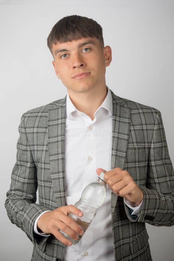 Young Entrepreneur Wearing a Suit Jacket and Open Neck Shirt Stock ...