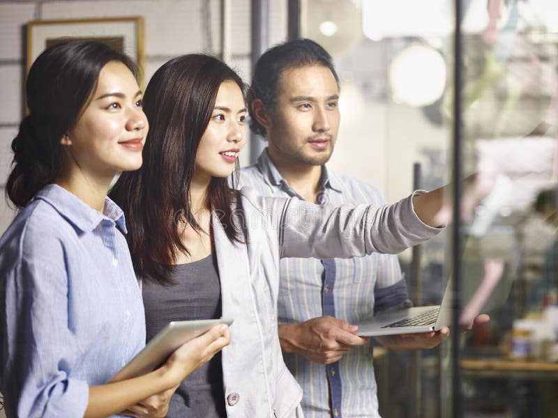 Young Entrepreneurs Working Together Making Business Plans Stock Photo ...