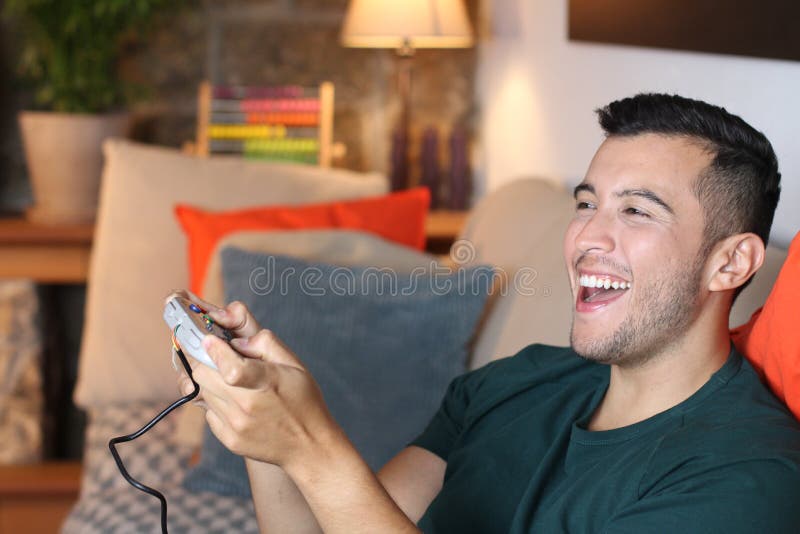 Young Ethnic Man Playing Video Games Stock Photo - Image of holding ...