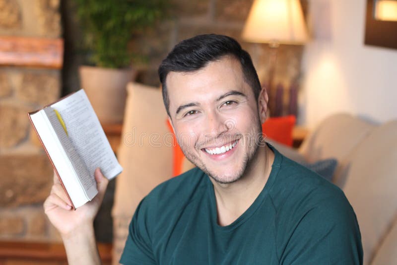 Young Ethnic Man Reading a Book Stock Photo - Image of happy, holding ...
