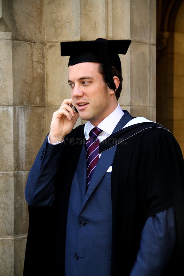 A Young Man in a Graduation Gown. Stock Photo - Image of person ...