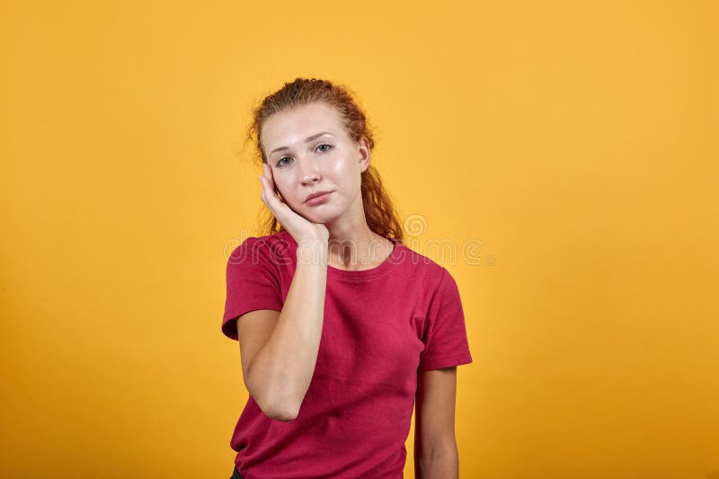 Young European Woman Keeping Her Hand On Cheek Pretending A Toothache