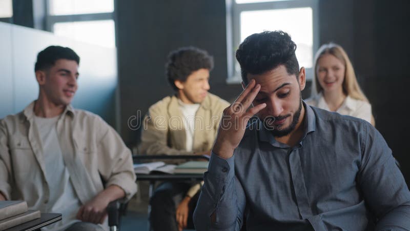 Young Excited Arab Guy Student Sitting in Classroom Cannot Concentrate ...