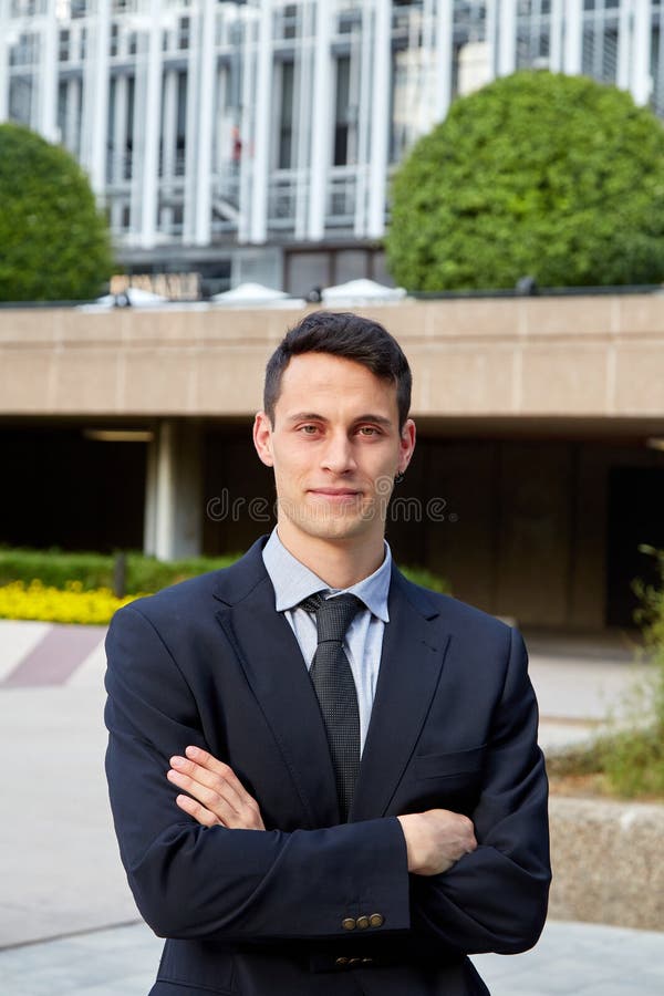 Young Executive Man Looking at Camera with Arms Crossed Stock Photo ...