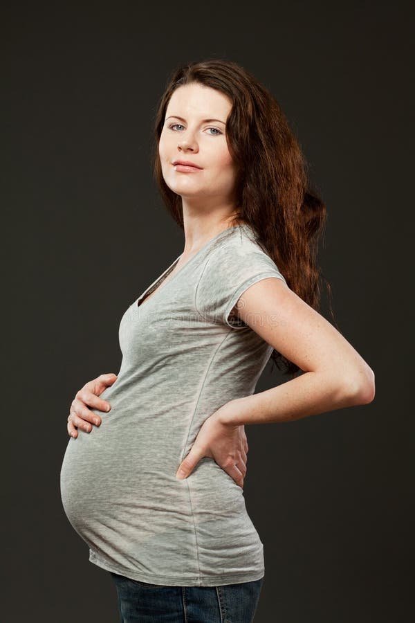 Young Expecting Mother with Long Dark Hair. Stock Image - Image of ...