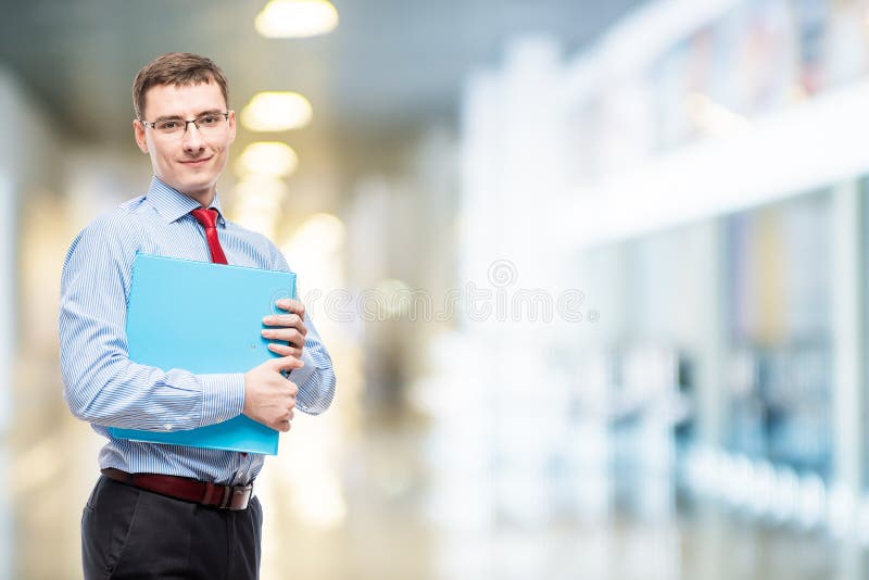 Young Experienced Accountant Man with a Folder Stock Photo - Image of ...
