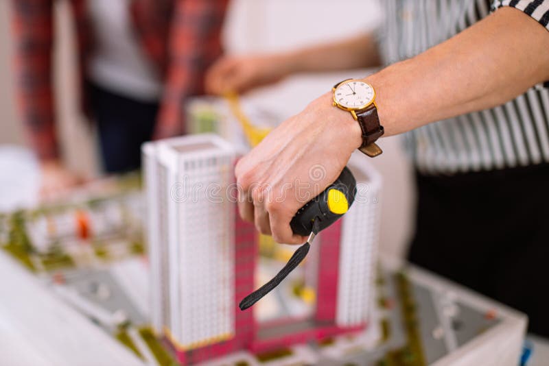 Young Experts Architects Make High-rise Building Model Stock Photo ...