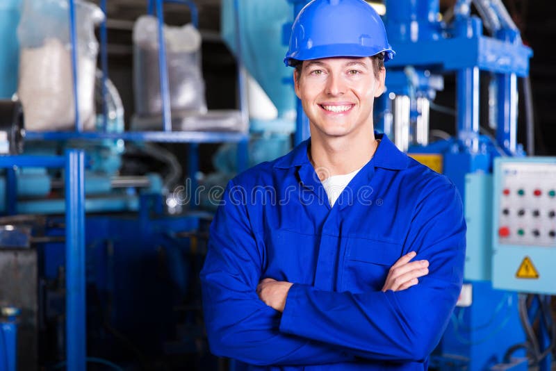 Young factory worker stock photo. Image of arms, leader - 45398130