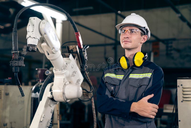 Young Factory Worker Working with Adept Robotic Arm Stock Image - Image ...
