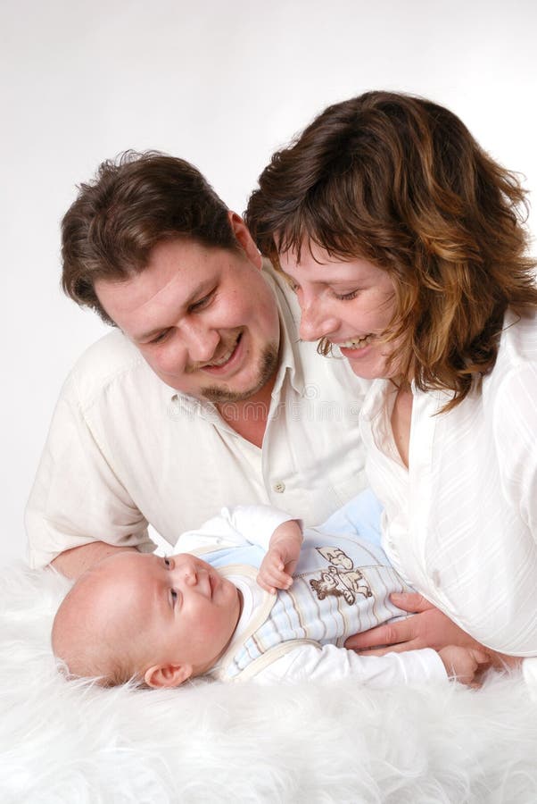 Young family stock image. Image of affectionate, newborn - 1692527