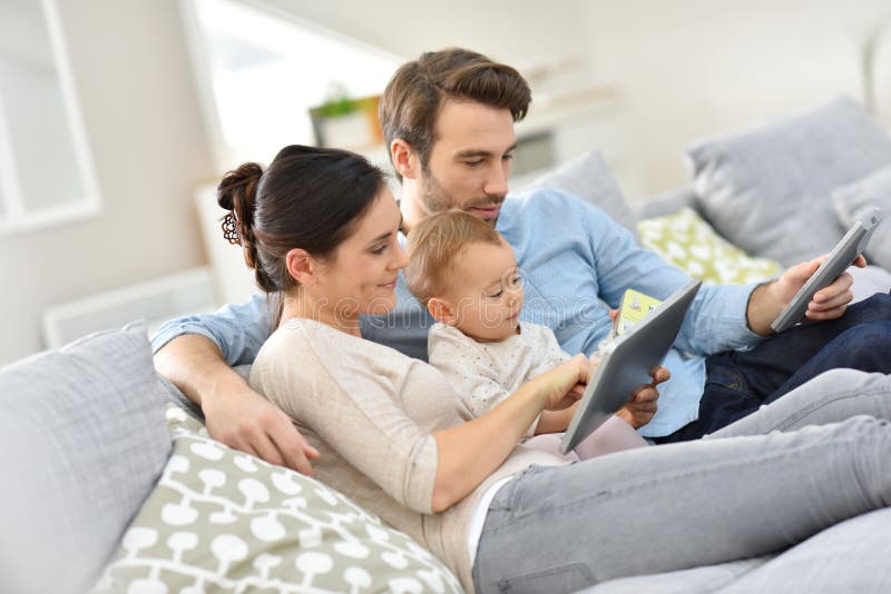Family of 6 Using Tablet at Home Stock Image - Image of sofa, sitting ...
