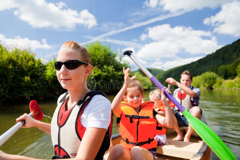 Young Family Canoeing stock image. Image of caucasian - 91079591