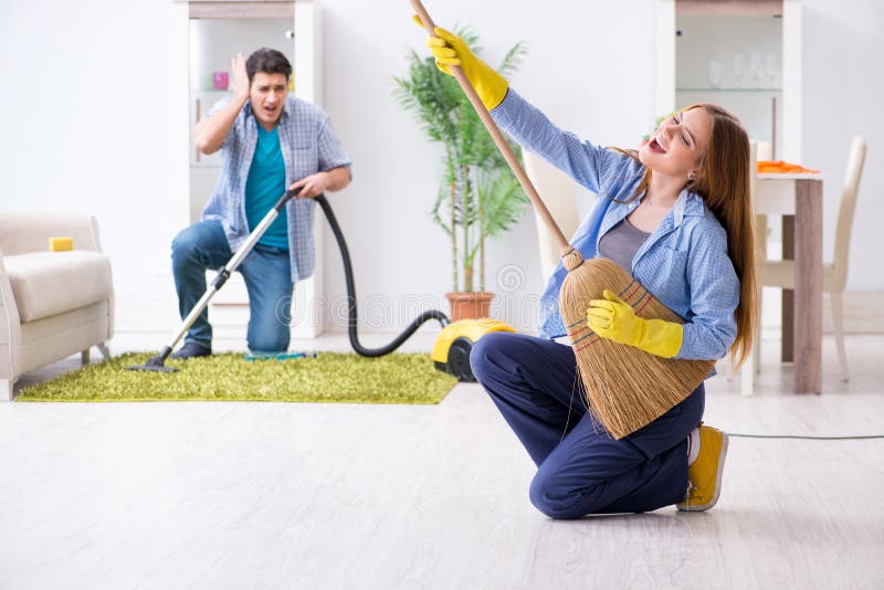 The Young Family Cleaning the House Stock Image - Image of husband ...