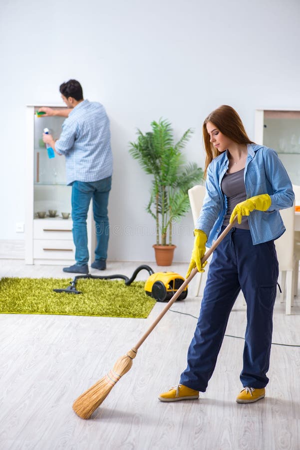 The Young Family Cleaning the House Stock Photo - Image of floor ...
