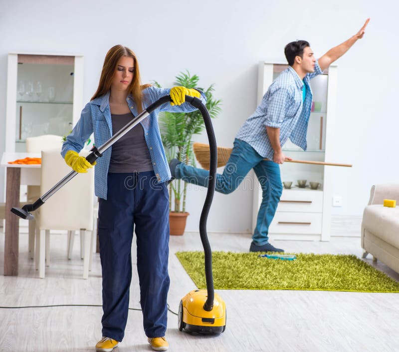 Young Family Cleaning the House Stock Image - Image of husband ...