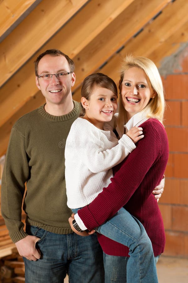 Young Family on a Construction Site Stock Image - Image of site ...