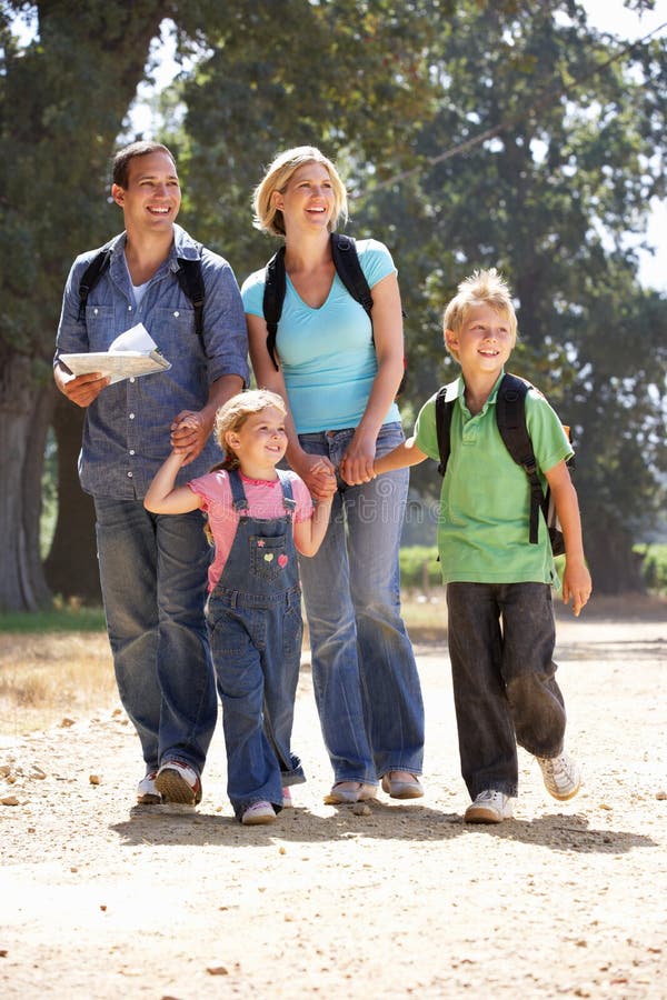 Young Family on Country Walk Stock Photo - Image of portrait, male ...