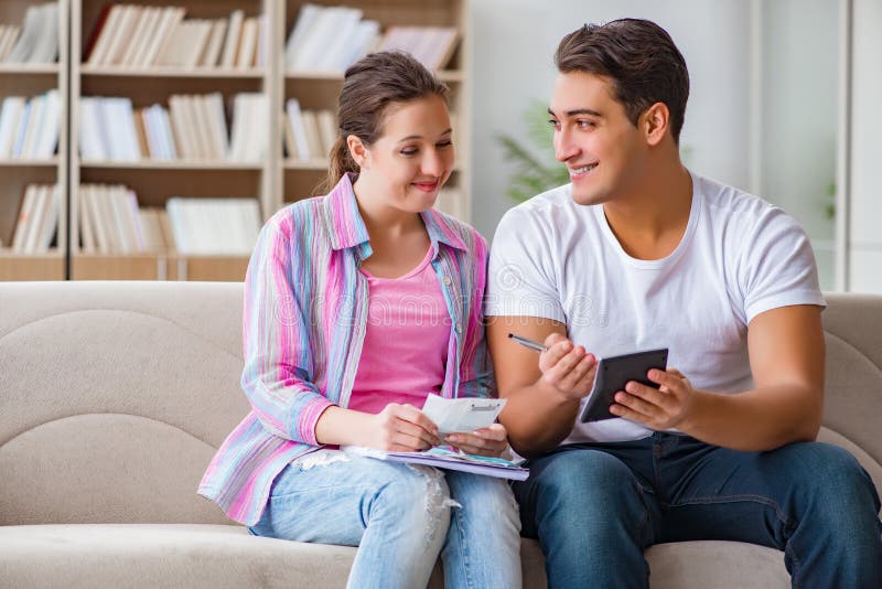 The Young Family Discussing Family Finances Stock Image - Image of ...