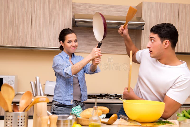 The Young Family Doing Funny Fight at Kitchen Stock Image - Image of ...