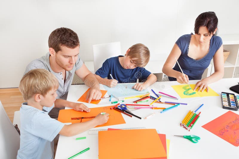 Young Family Drawing with Colorful Pencils Stock Image - Image of ...